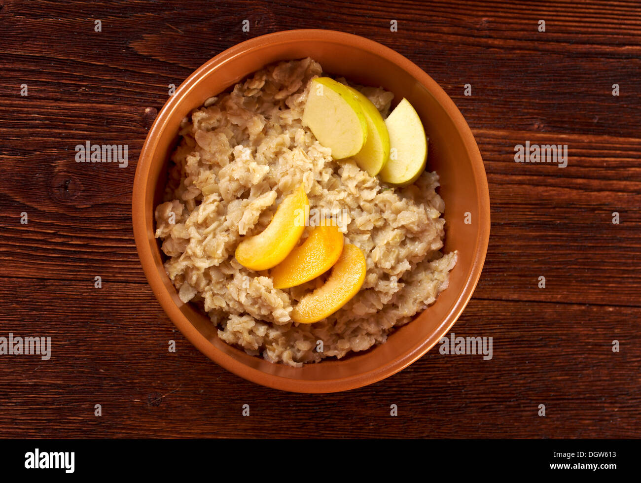 Oat porridge with fruit Stock Photo - Alamy