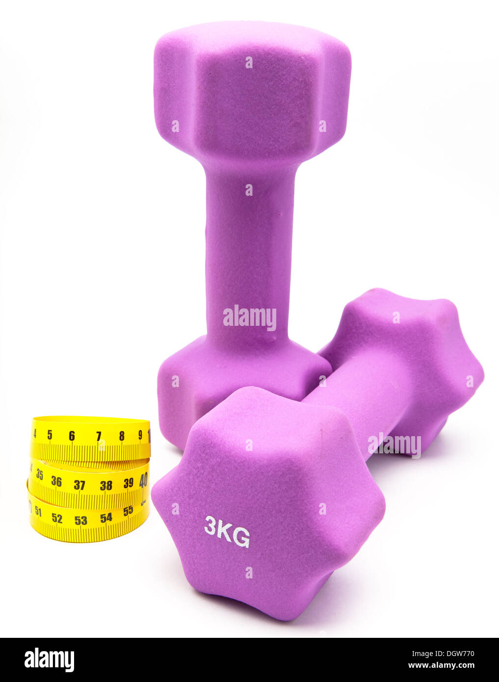 Measuring tape and and Pink dumbbells Stock Photo - Alamy