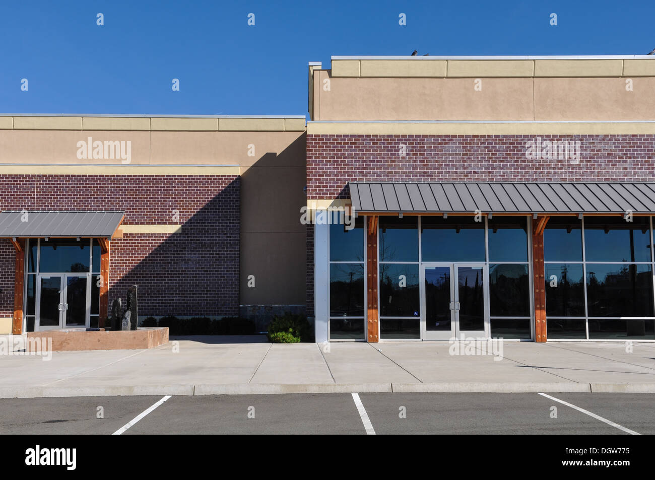 New Shopping Center made of Brick Facade Stock Photo - Alamy