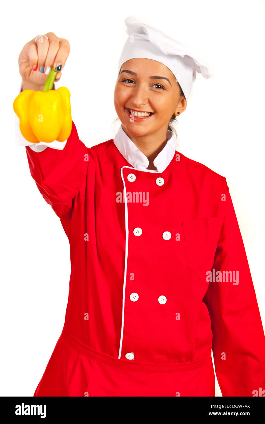 Chef woman giving yellow bell pepper isolated on white background Stock ...