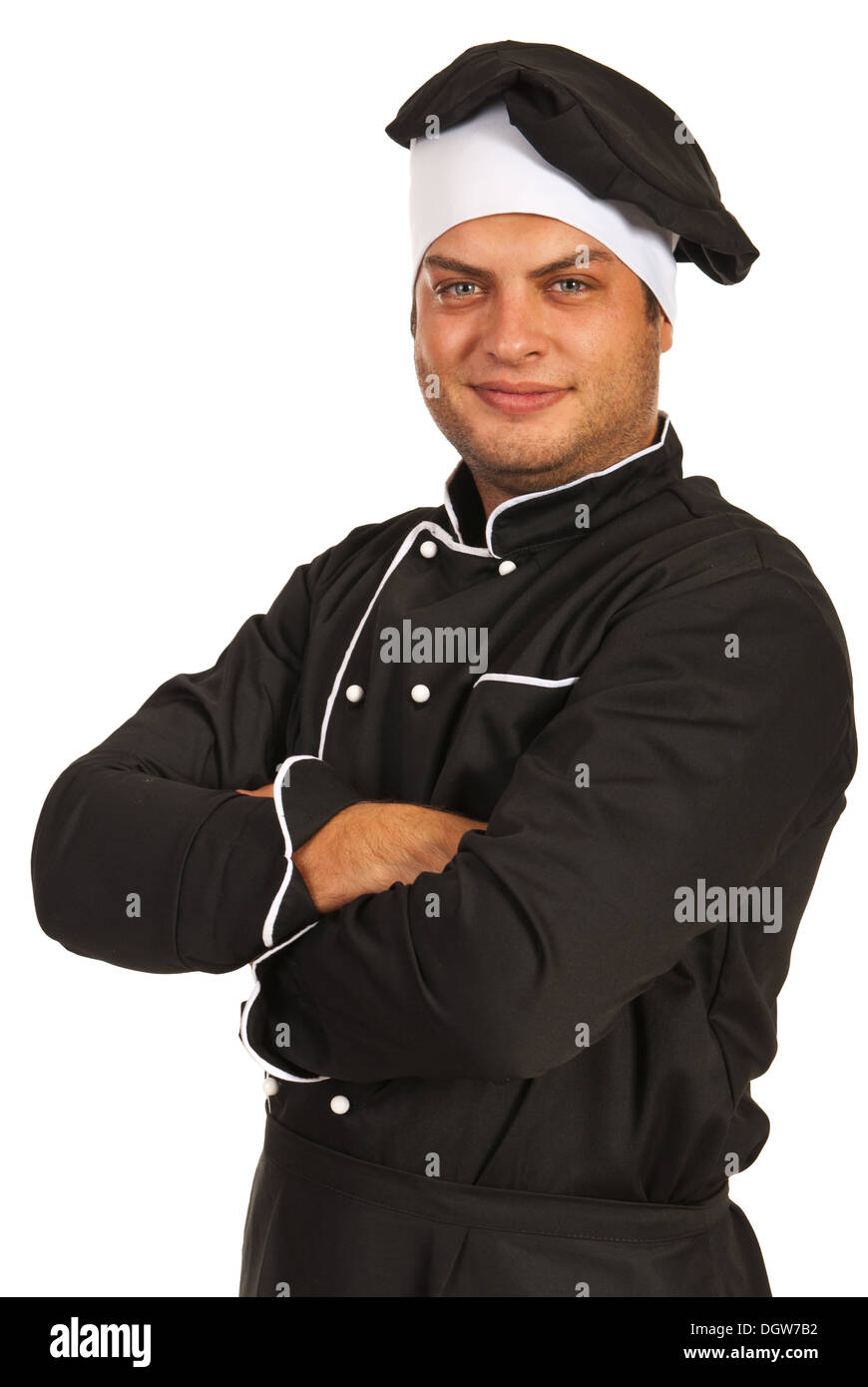 Smiling chef man in black uniform standing with arms folded isolated on ...