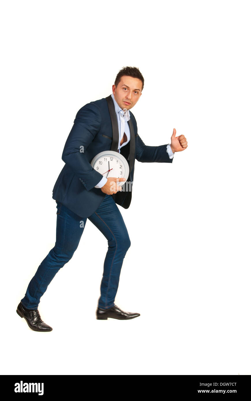 Business man with clock being in a rush isolated on white background ...