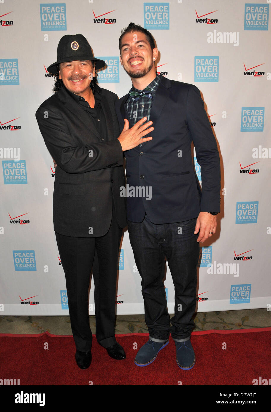 Los Angeles, California, USA. 25th Oct, 2013. Carlos Santana, Salvador Santana attending the ...