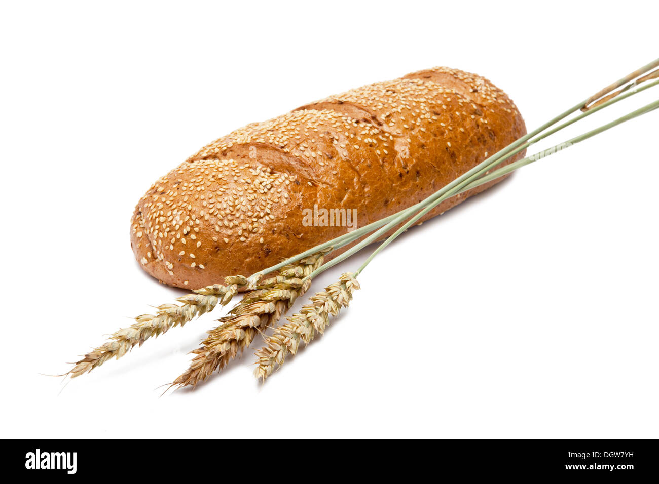Wheat and bread on white background Stock Photo - Alamy