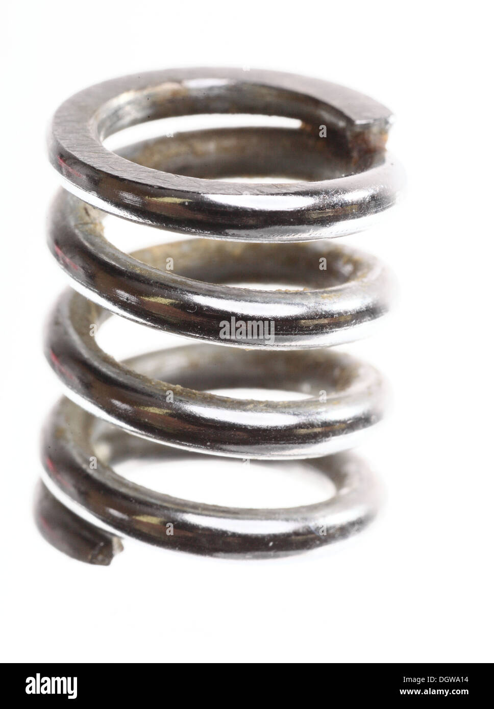 Metal steel industrial coil spring isolated on white Stock Photo - Alamy