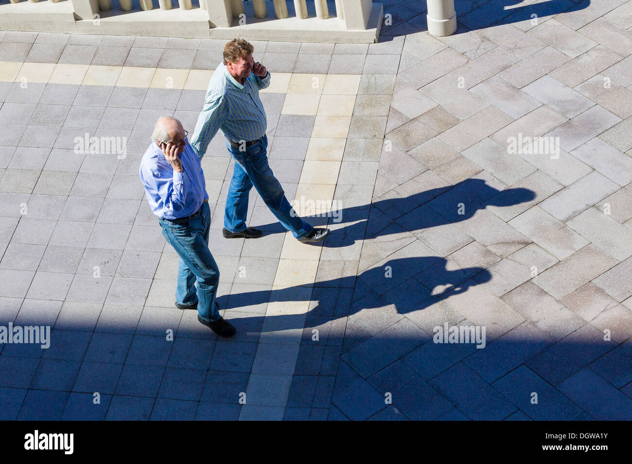 Using mobile phones while walking the streets of Las Vegas Stock Photo ...