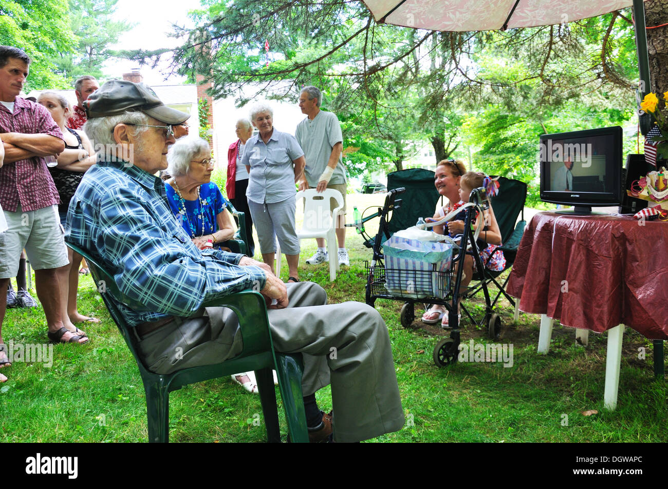 Family birthday celebration party - watching family video Stock Photo ...