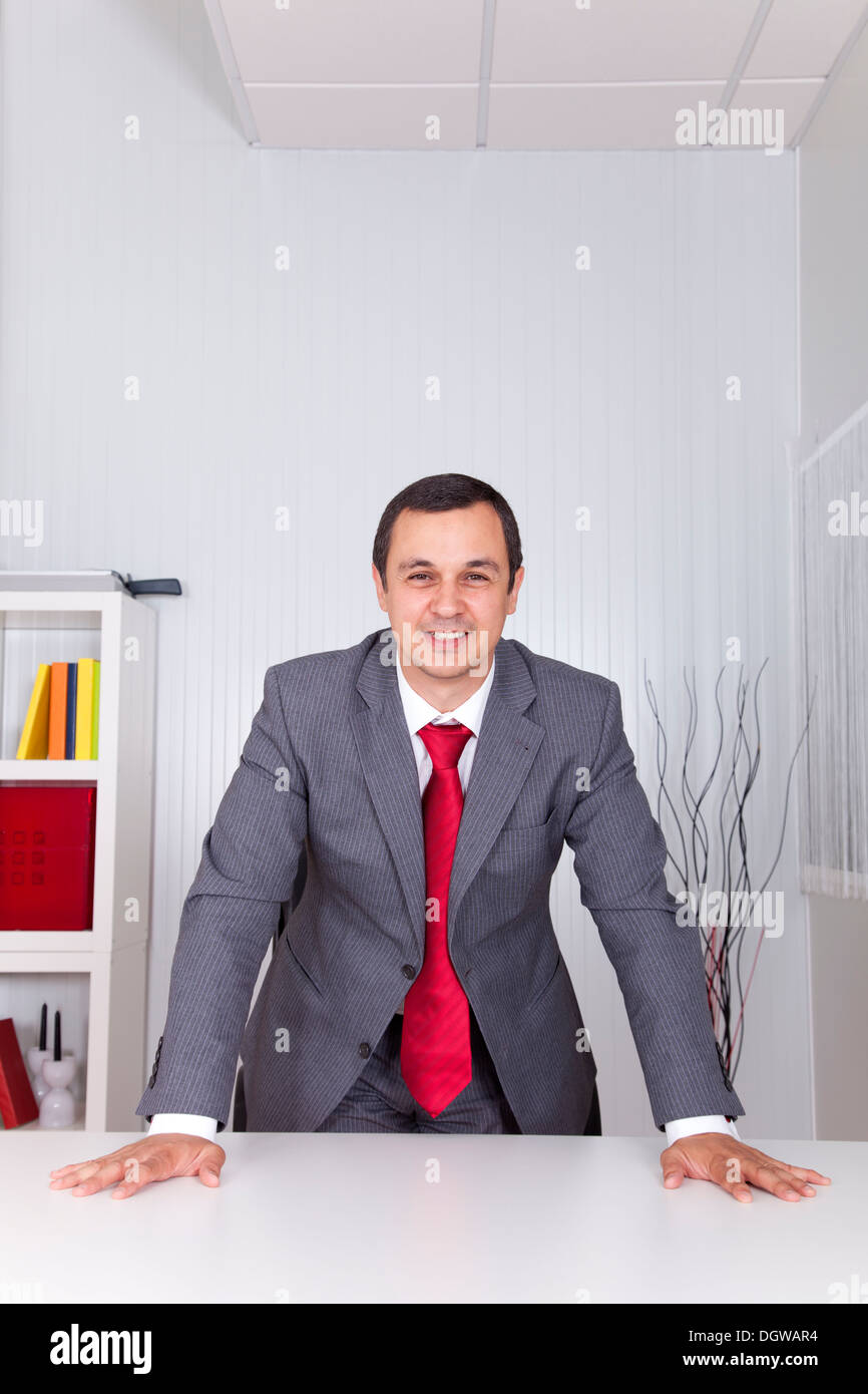 Modern and powerful businessman at his office Stock Photo - Alamy