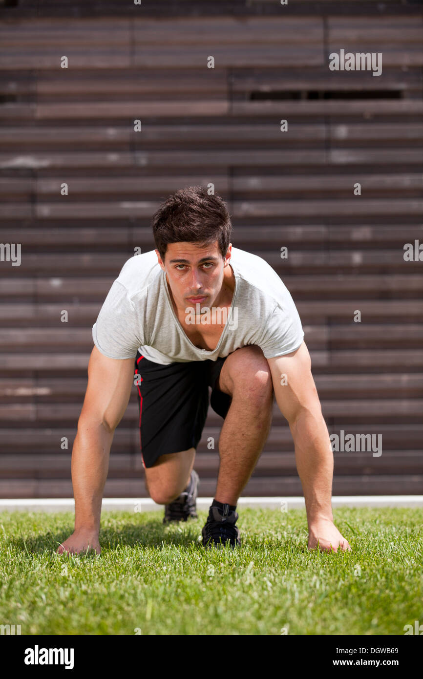 Men athlete starting running Stock Photo - Alamy