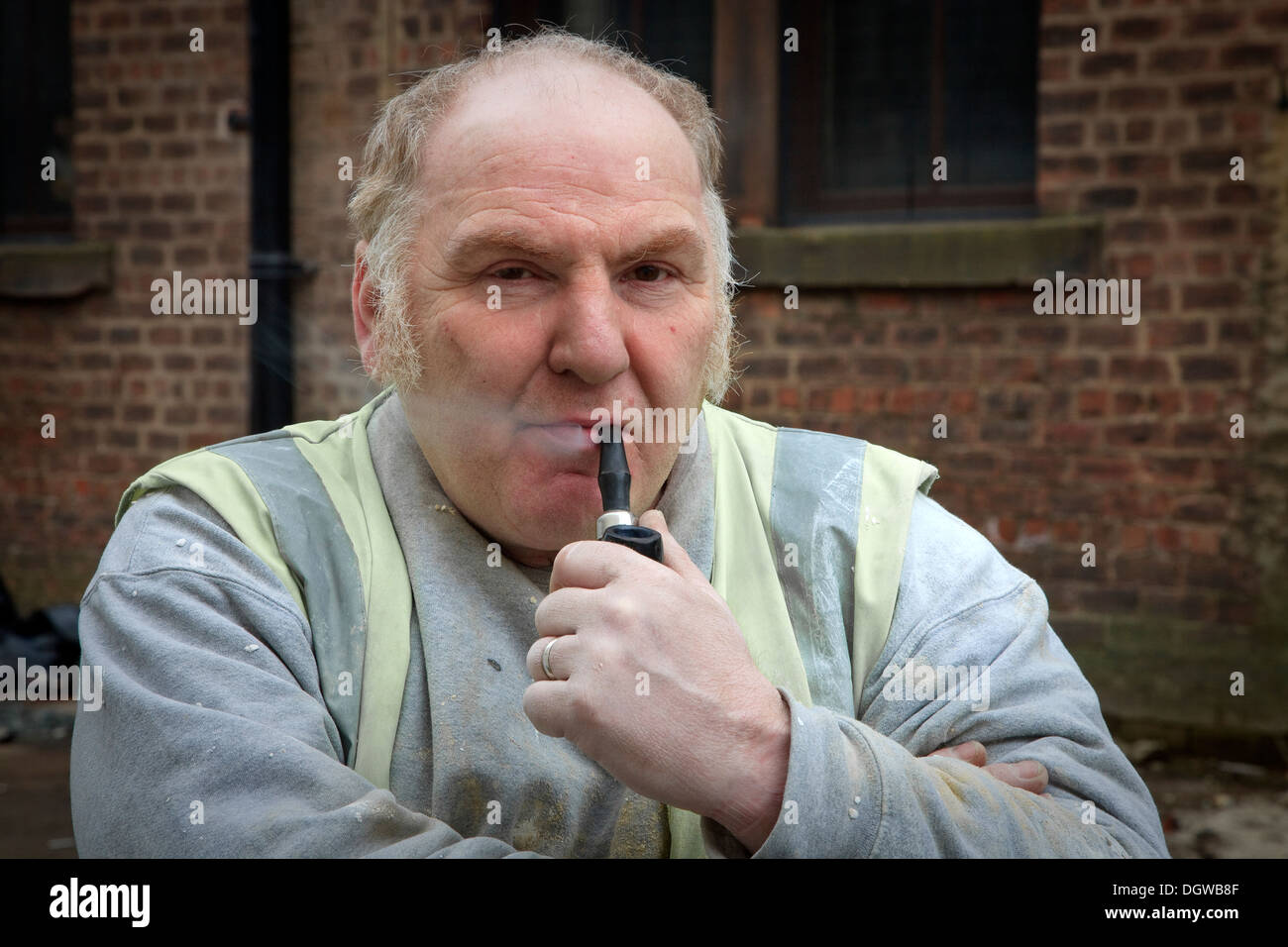 Alex Renwick, plasterer, from Edinburgh, smoking his pipe at the rear ...