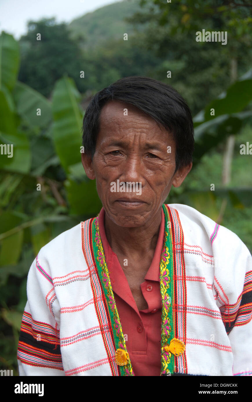 Portrait, man in traditional costume, smallest ethnic minority in China ...