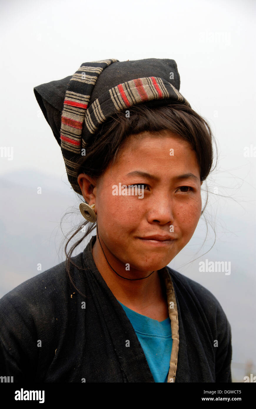 Young woman of the Mouchi tribe, portrait, traditional clothing, hat ...