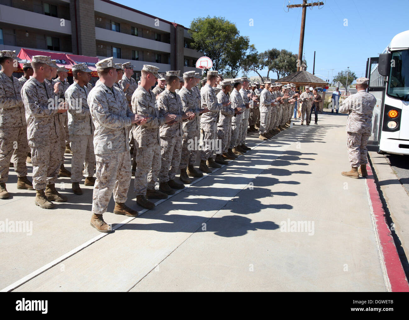 Marines with 1st Air Naval Gunfire Liaison Company applaud Marines with ...
