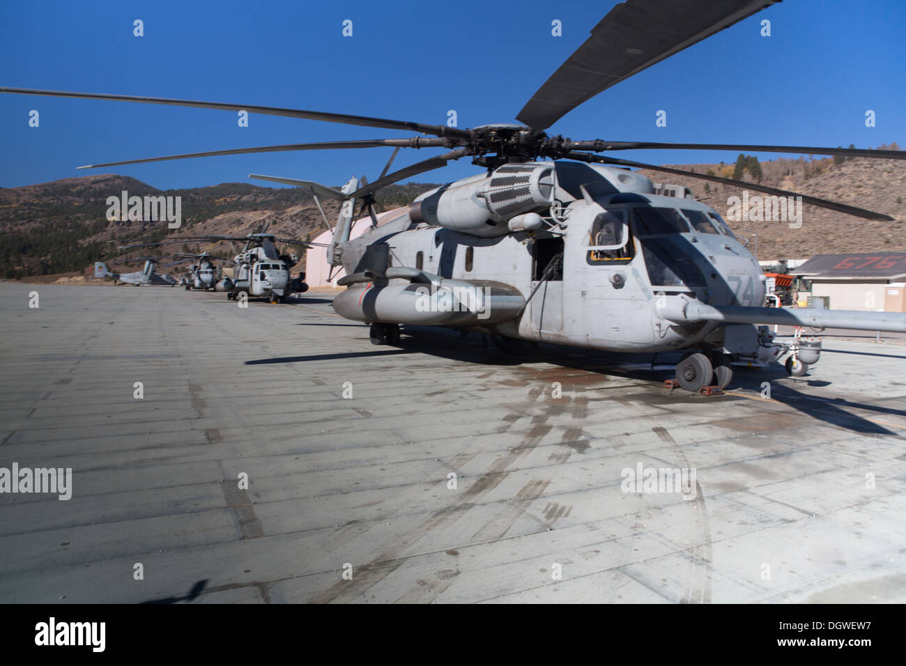 Four U.S. Marine Corps CH-53E Super Stallion transport helicopters with ...