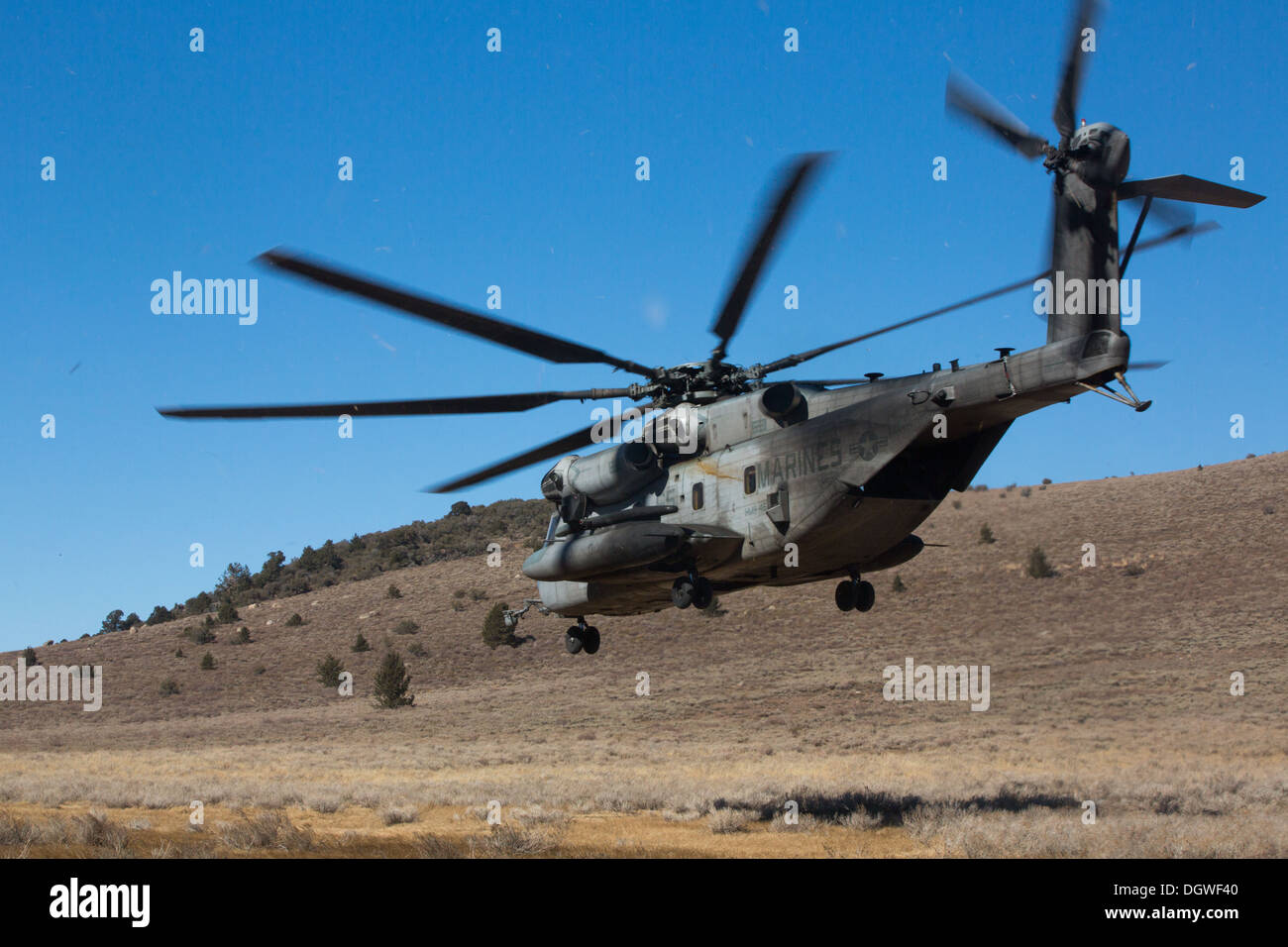A U.S. Marine Corps CH-53E Super Stallion transport helicopter with ...