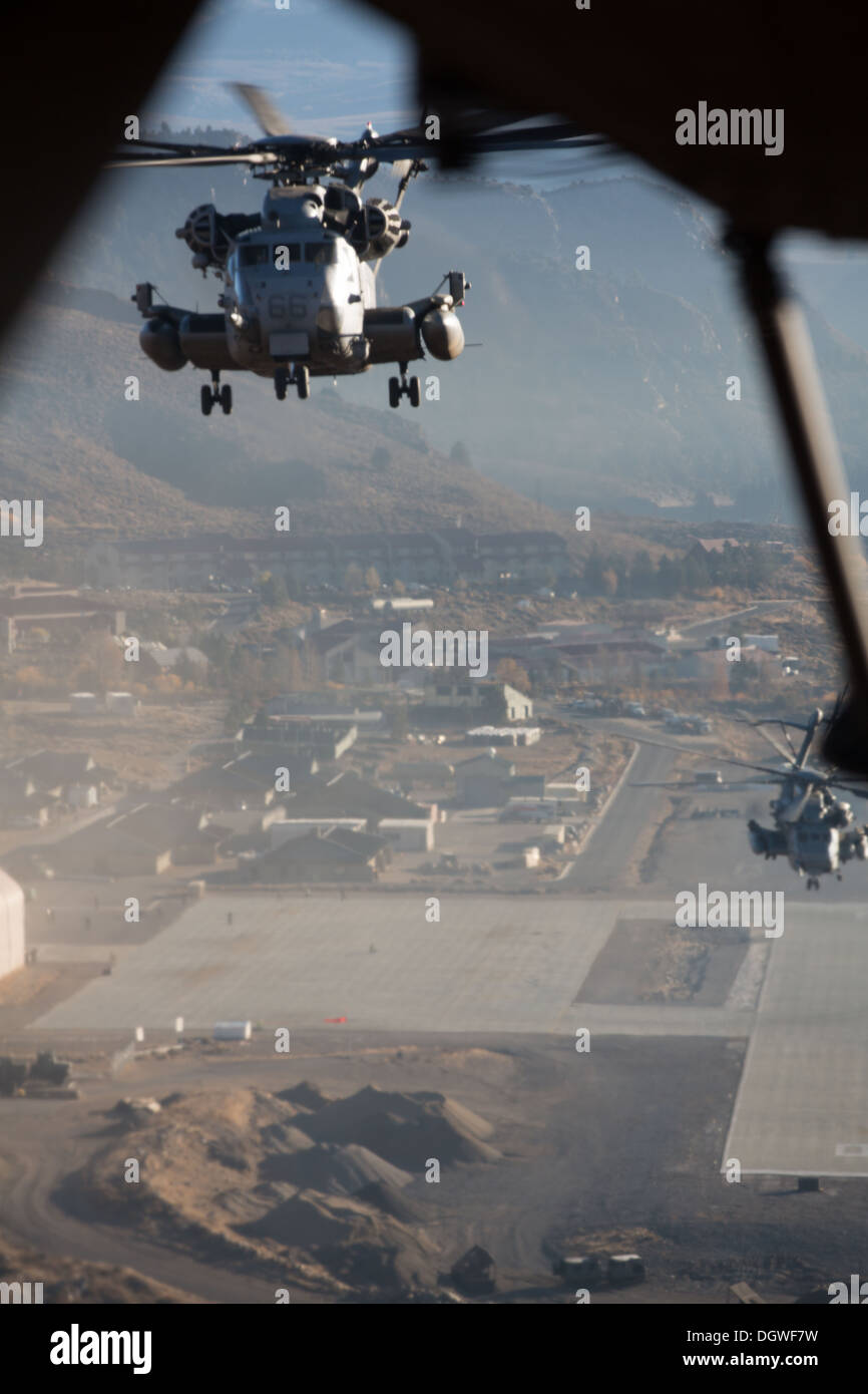 Four U.S. Marine Corps CH-53E Super Stallion transport helicopters with ...