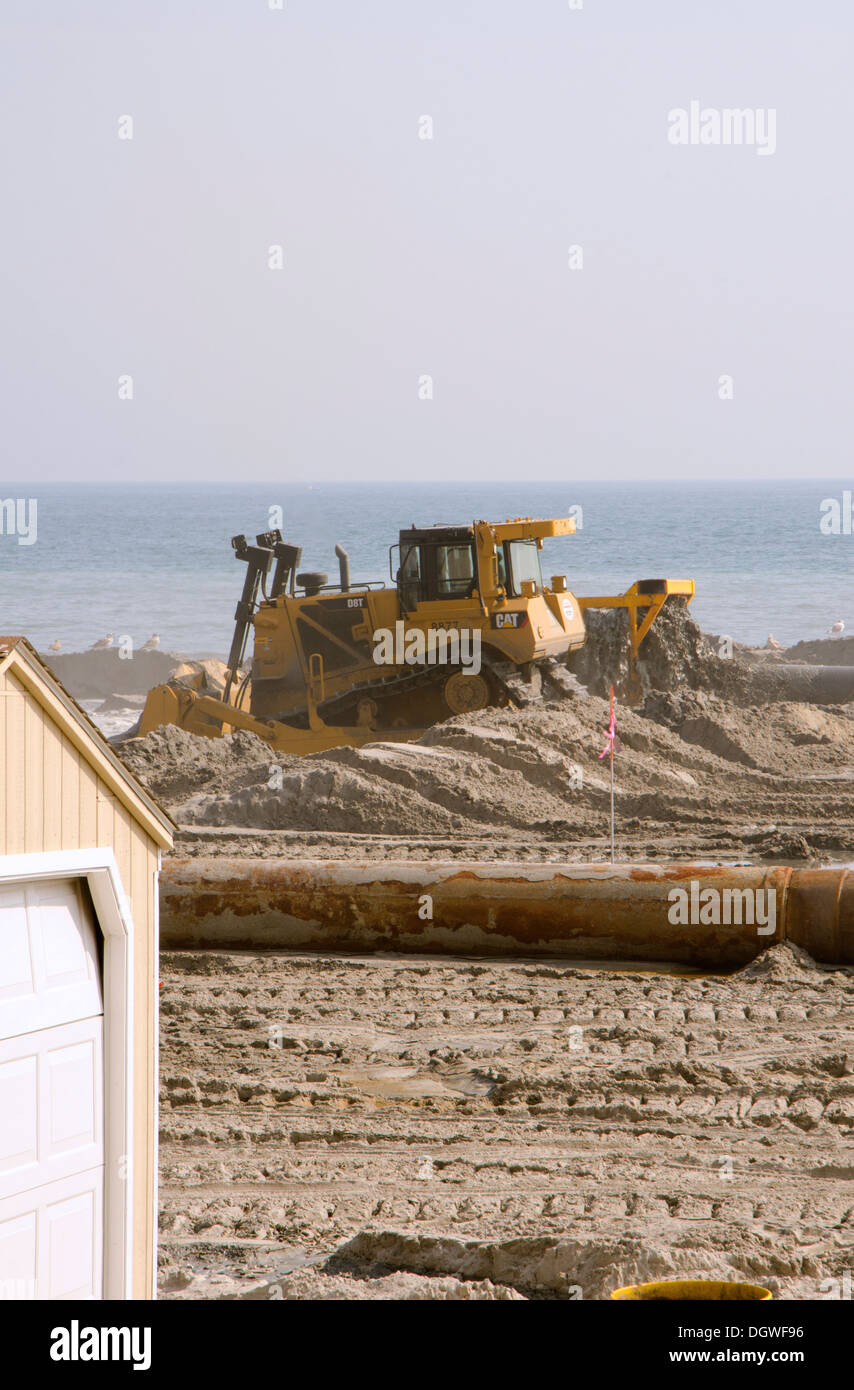Bulldozer restoring Beach next to Boardwalk at Atlantic CIty, New ...