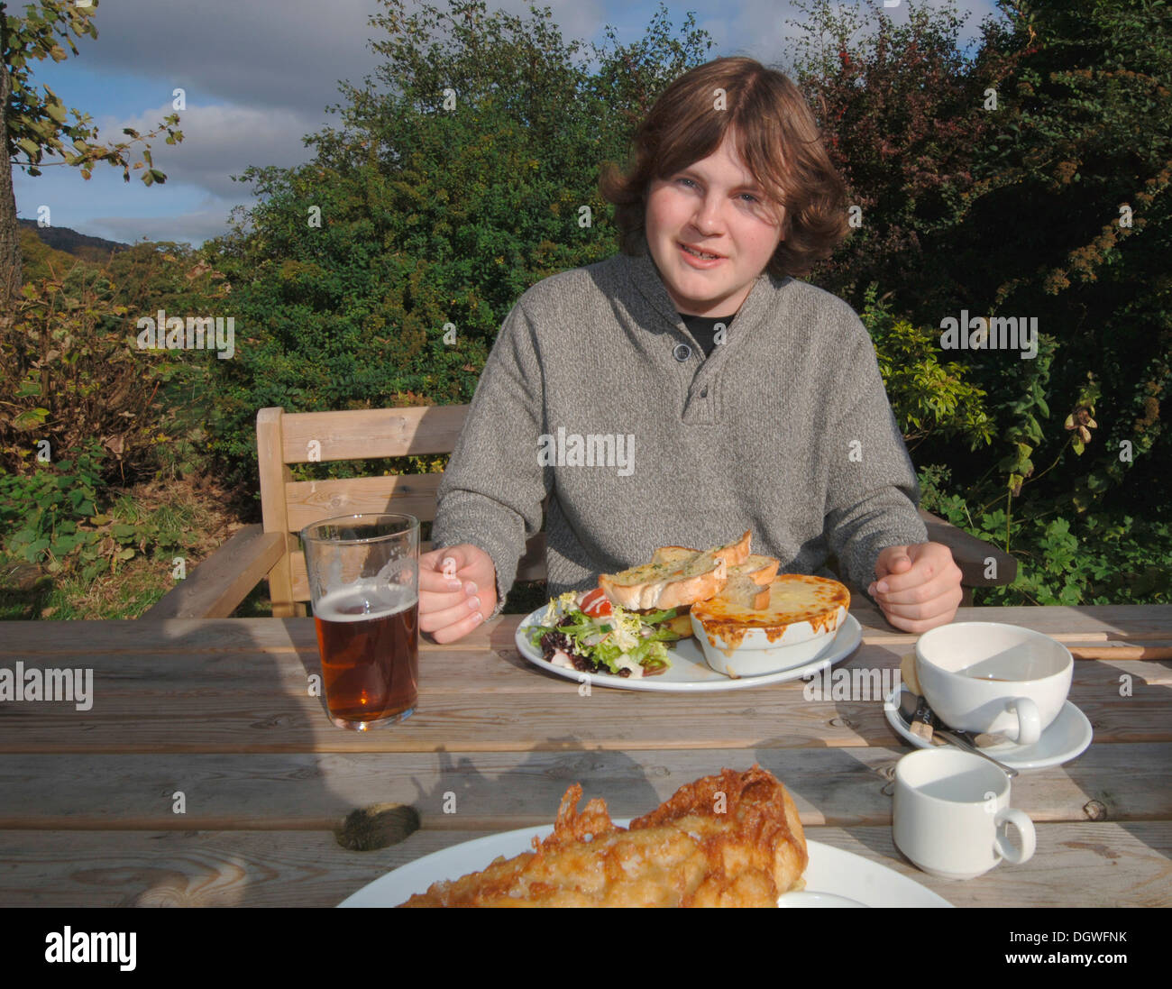 An 18yr Old Teenager Eating A Pub Meal Stock Photo - Alamy