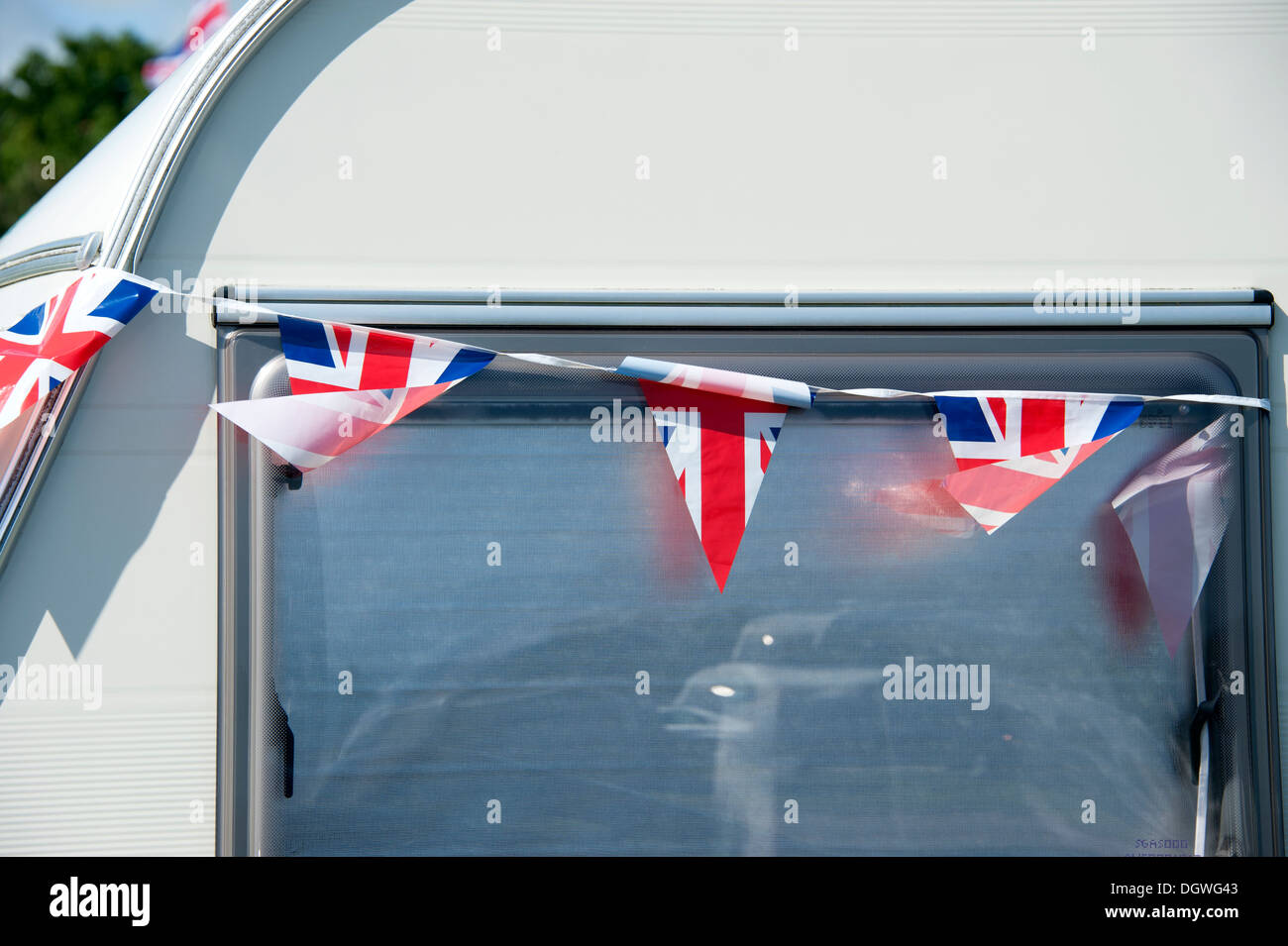 Union Jack Bunting Flags on Caravan Window Stock Photo - Alamy