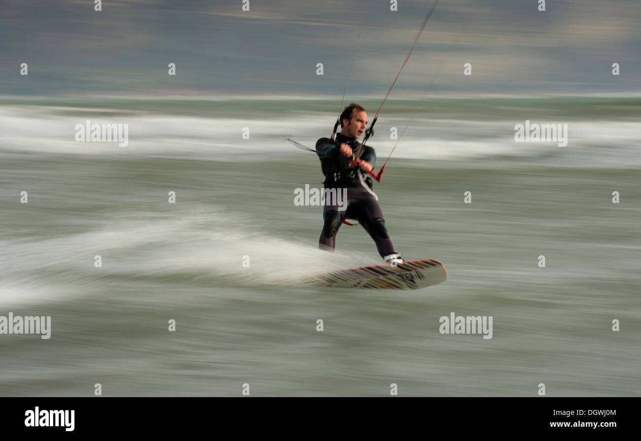 Kitesurfer is riding the waves hi-res stock photography and images - Alamy