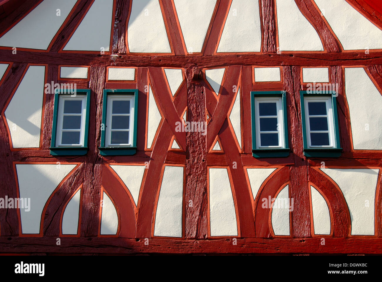 Detail, old renovated half-timbered house, red beams, narrow windows ...