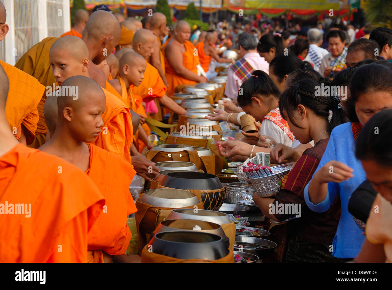 Theravada Buddhism, That Luang Festival, Tak Bat, monks standing behind ...
