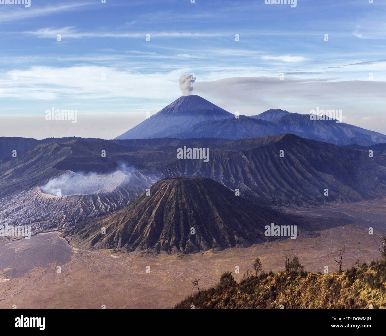 Mount Bromo with smoke, Mount Batok at front, Mt Kursi and Mt Gunung ...
