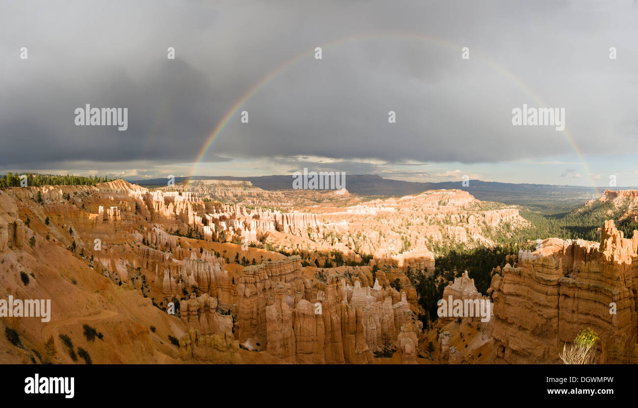 A 180 degree rainbow forms over Bryce Canyon National Park at sunset ...