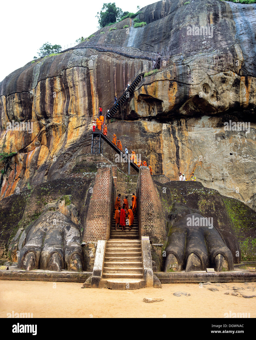 Monks at the Lion Staircase of the Rock of Sigiriya, Lion Rock, column ...