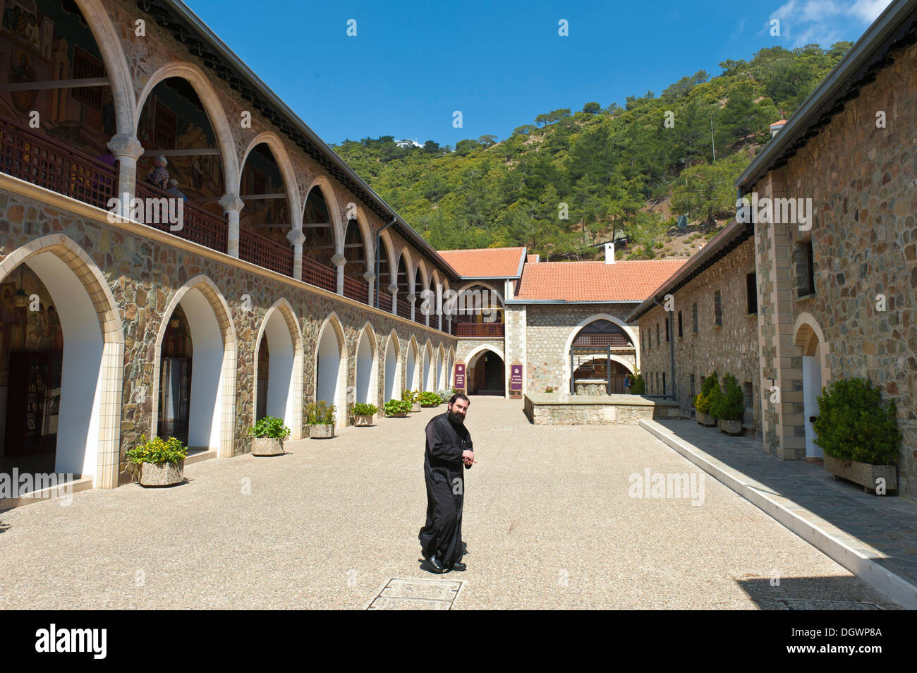 Greek Orthodox Church of Cyprus, black-clad monk in the courtyard of ...