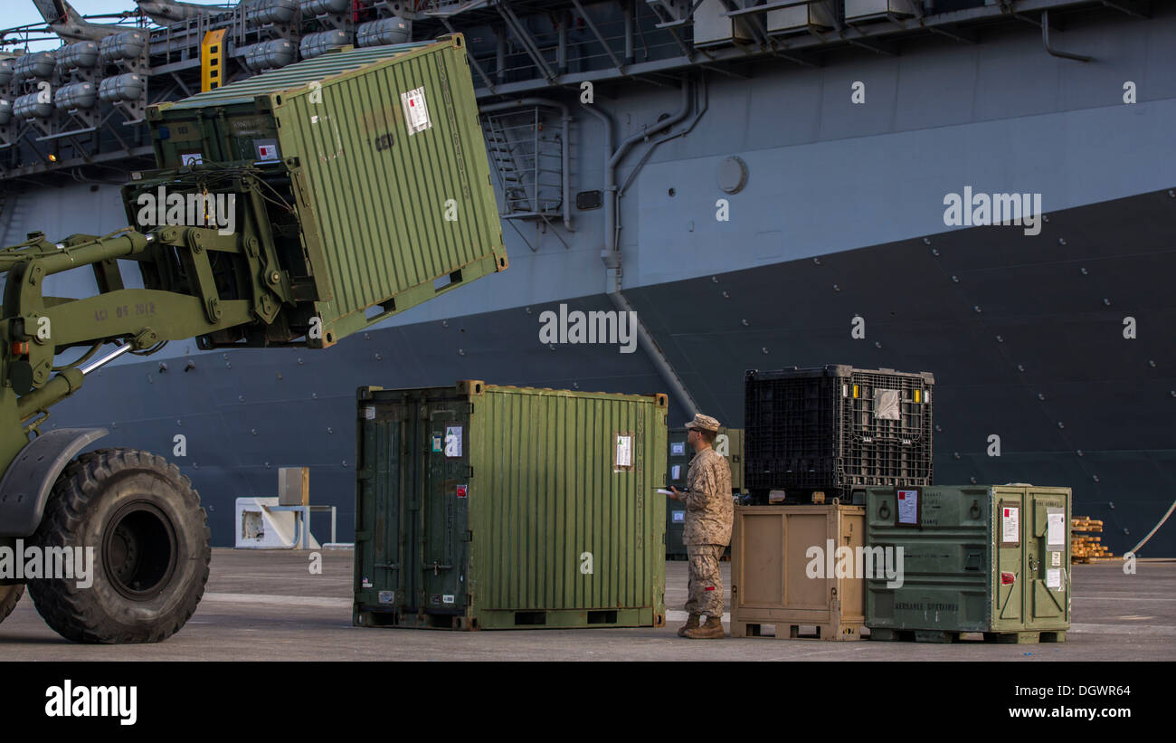 Shipping containers are stacked after being inspected by U.S. Customs ...