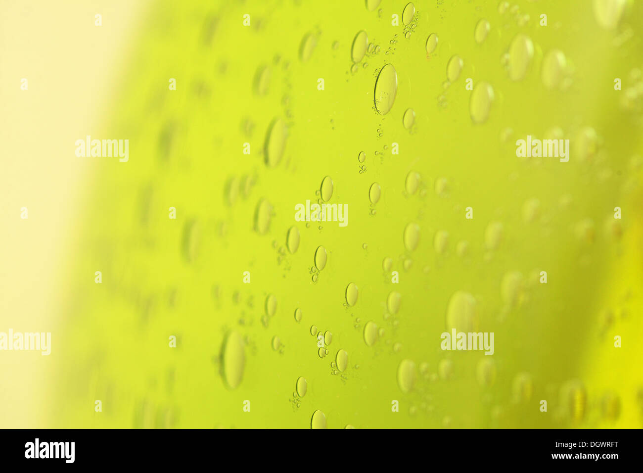 Green abstract blurred liquid background with soap bubbles Stock Photo ...