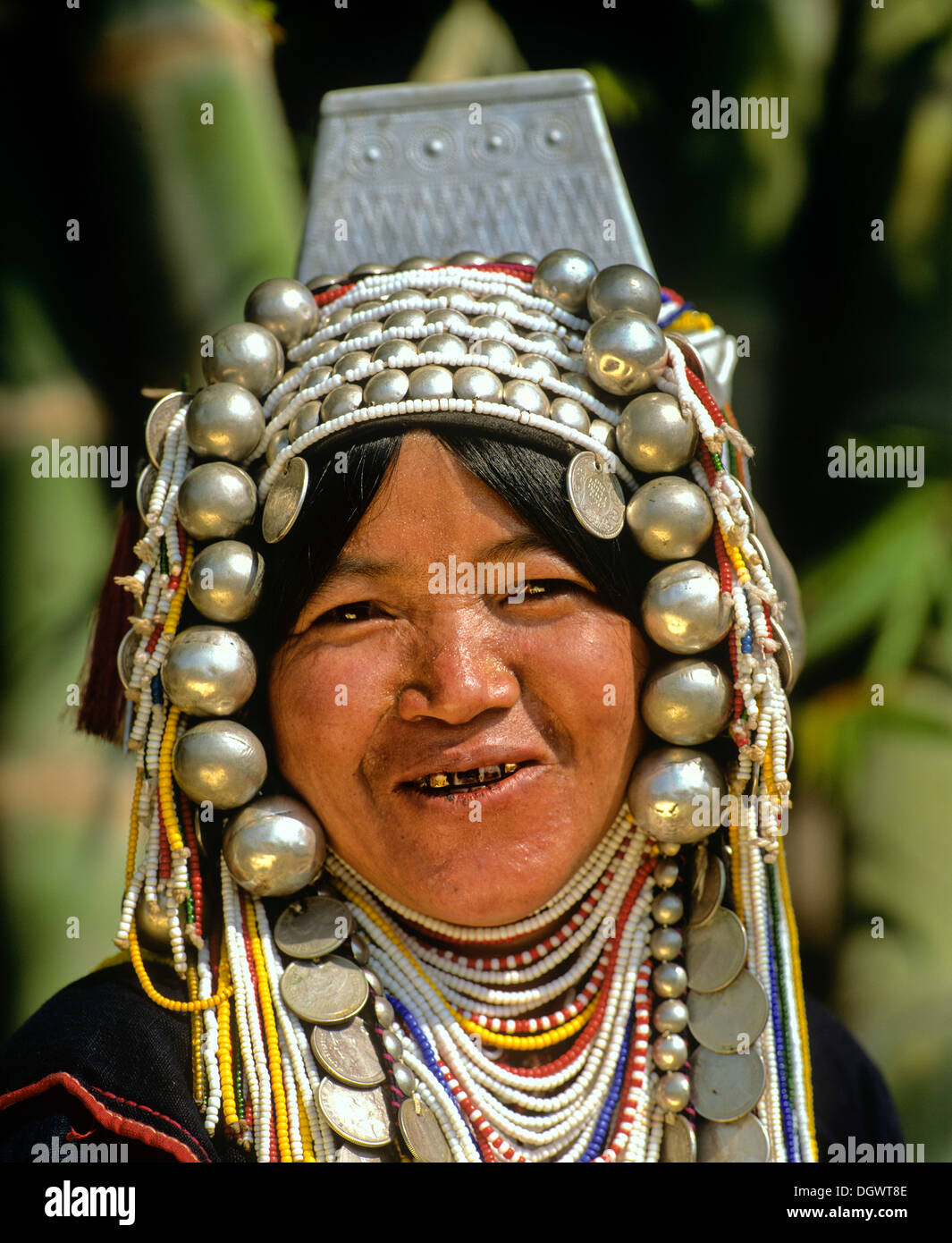 Woman from the people of the Akha wearing traditional costume with a ...