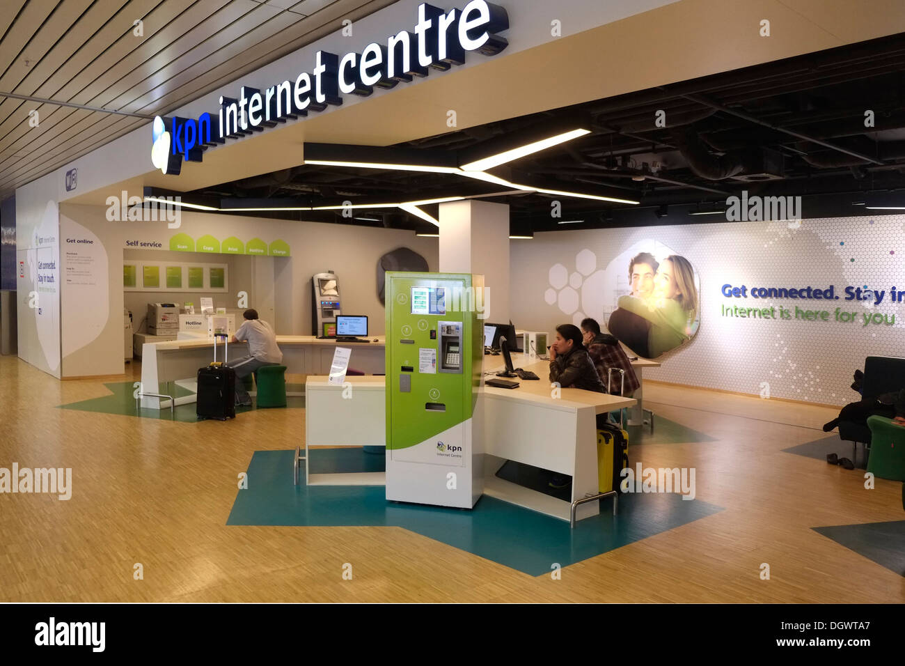 Passengers use computers at an internet lounge in Schiphol airport in ...