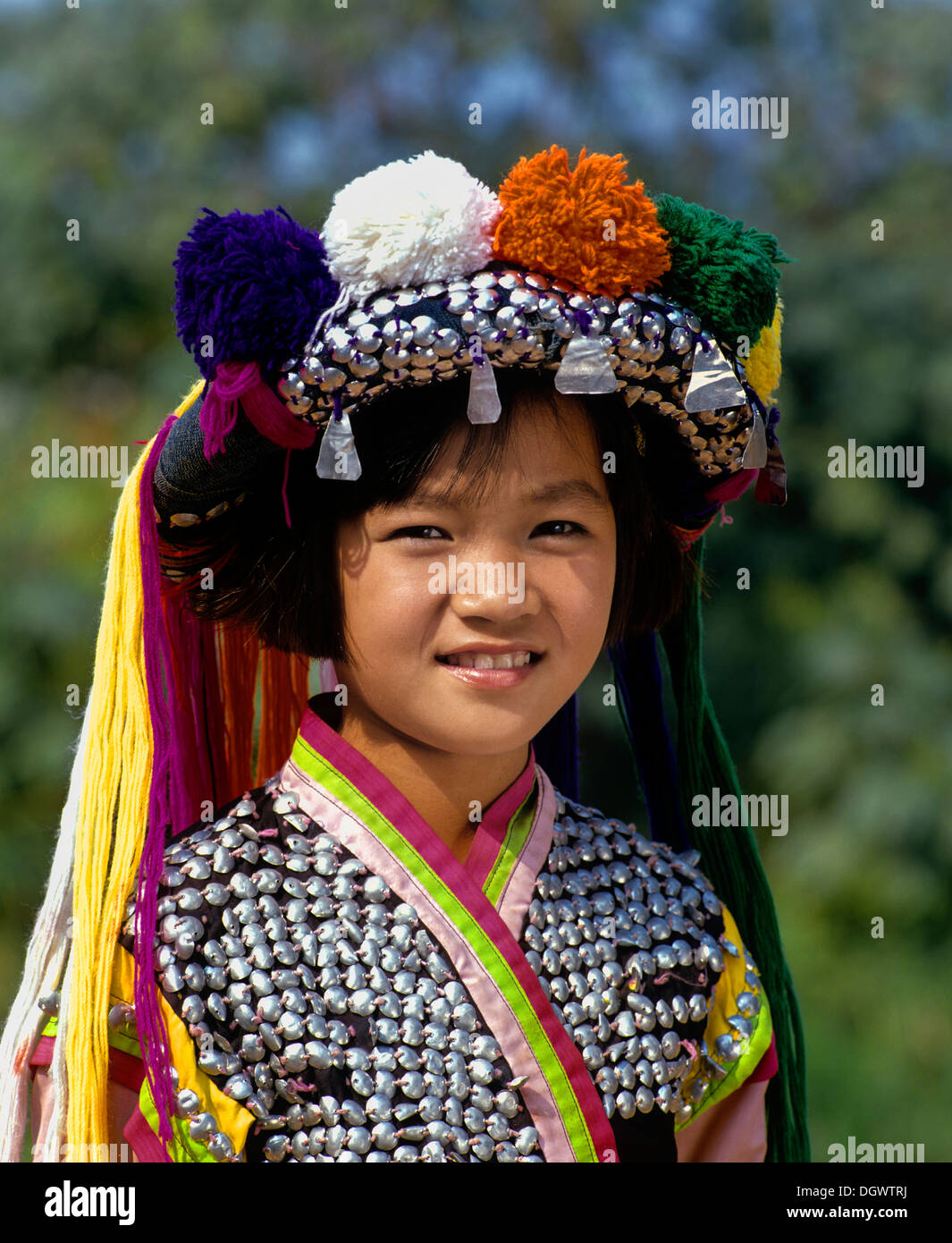 Lisu girl wearing a colourful headdress and the traditional costume of ...