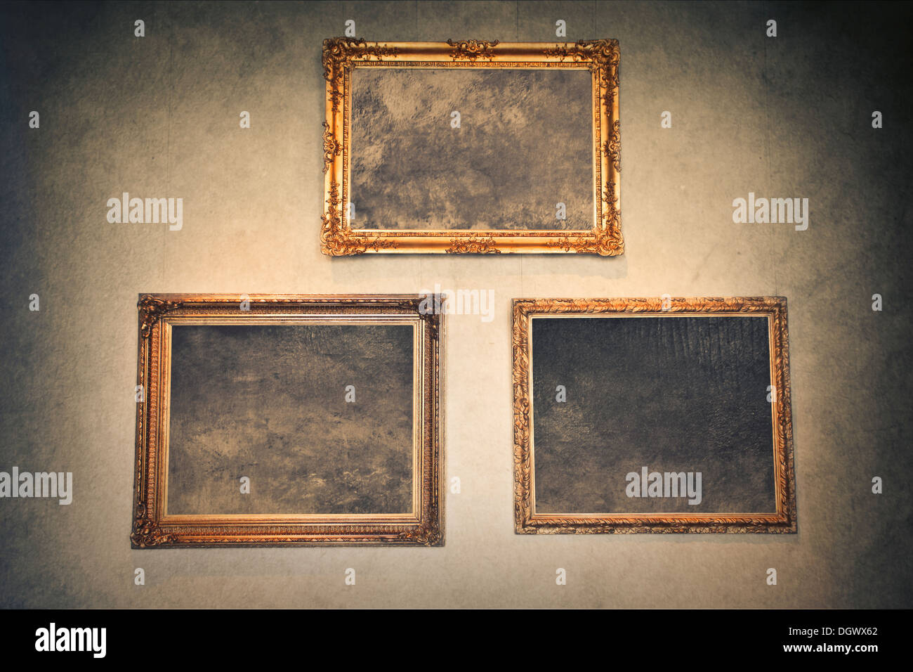Four empty frame on a wall Stock Photo - Alamy