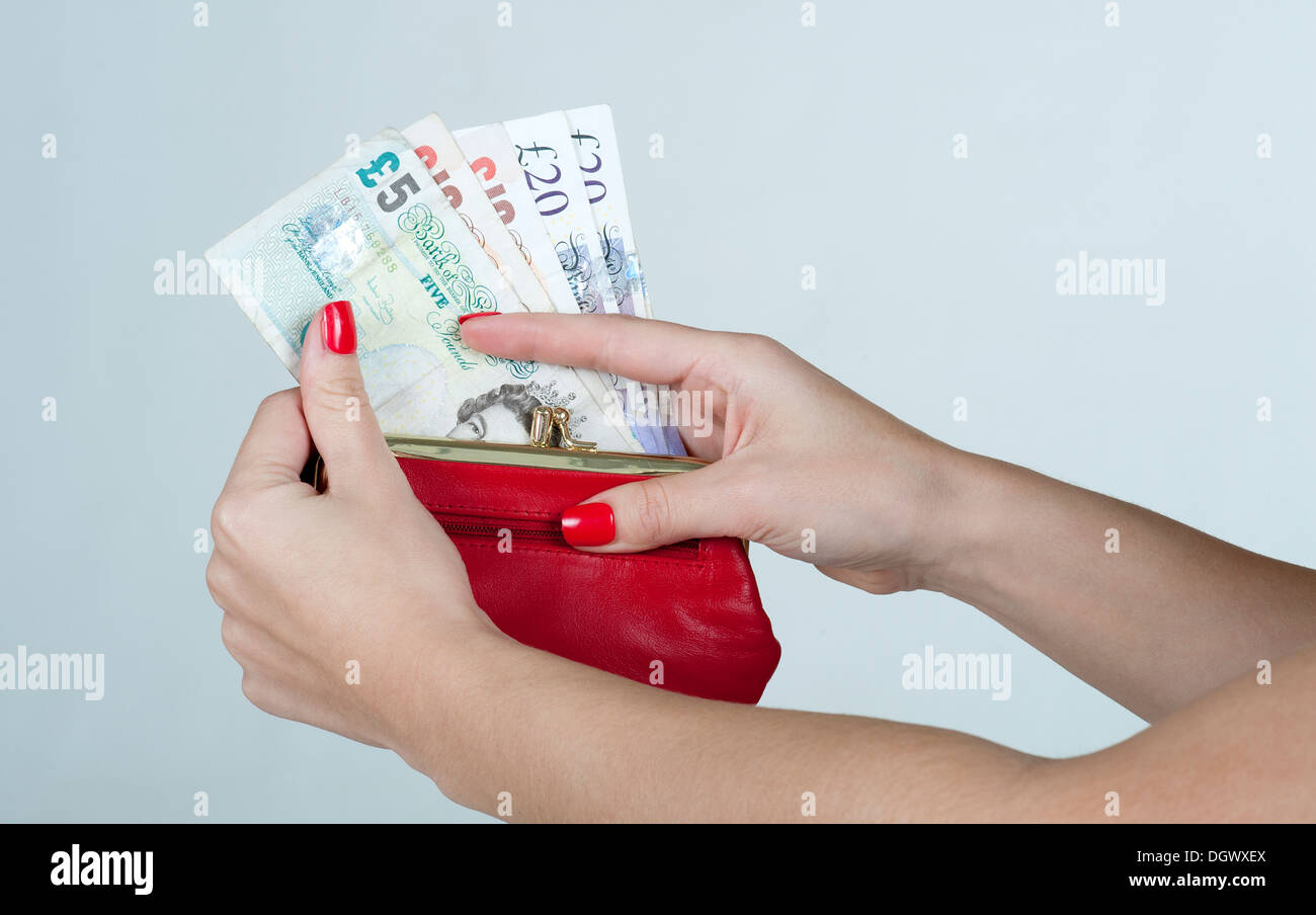 Woman pound notes money hi-res stock photography and images - Alamy