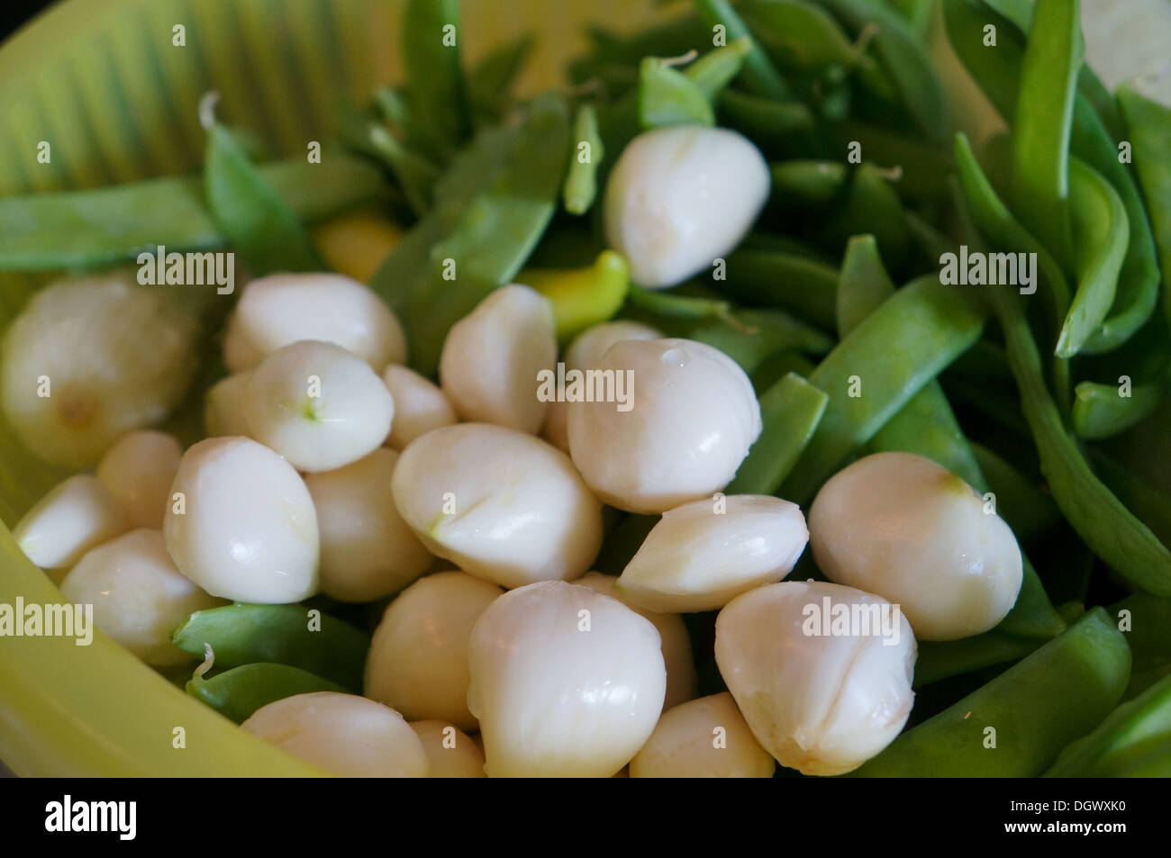 Garlic and sugar peas prepared for fermenting Stock Photo - Alamy