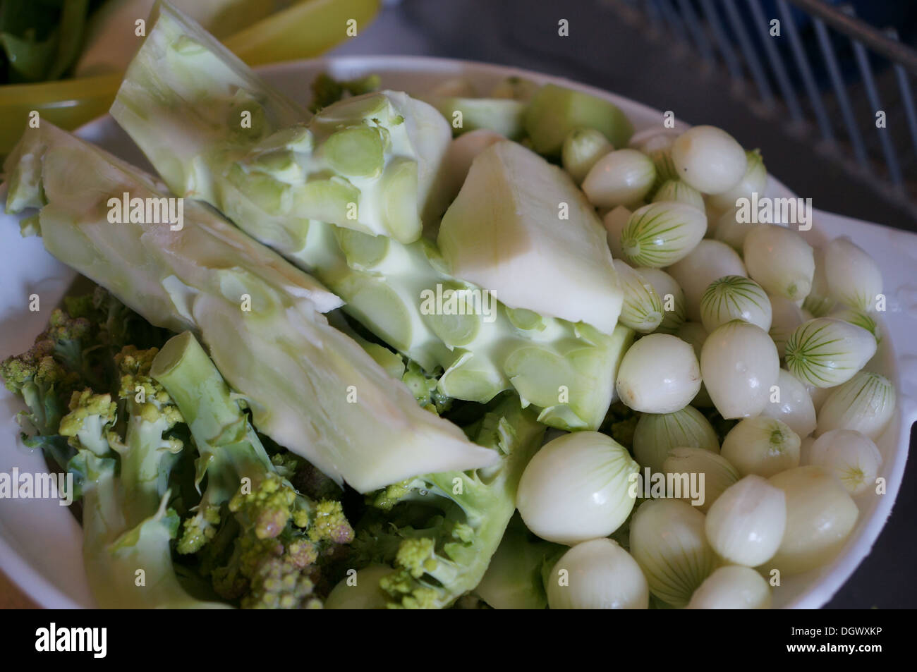 Onions, brocollo and sugar peas prepared for fermenting Stock Photo - Alamy