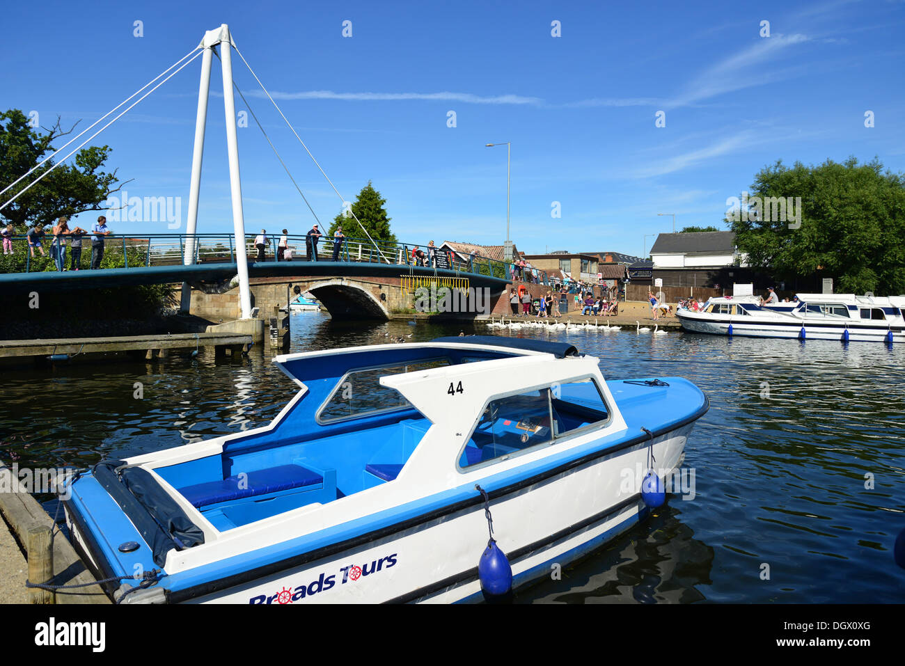 Cruise boat on River Bure by Wroxham Bridge, Wroxham, Norfolk Broads ...
