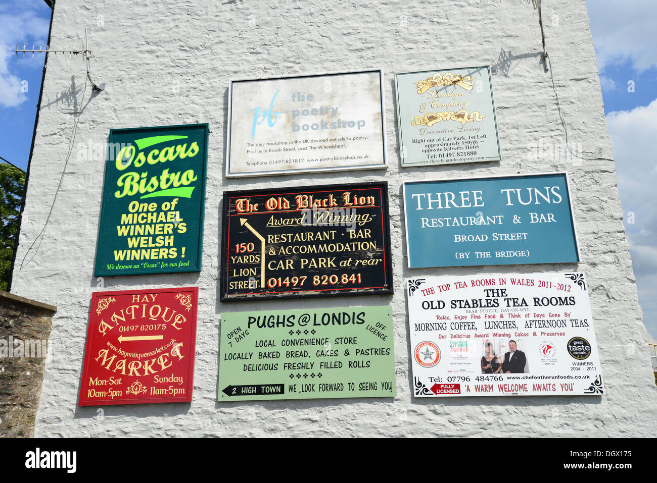 Advertising signs on end of building, Hay-on-Wye, Powys, Wales, United ...