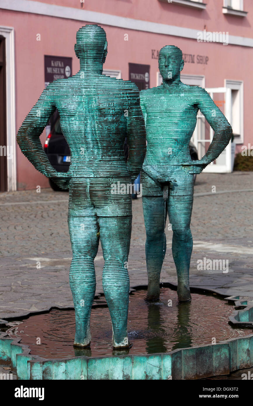 Statue of David Černý of two men urinating on relief Czech Republic ...