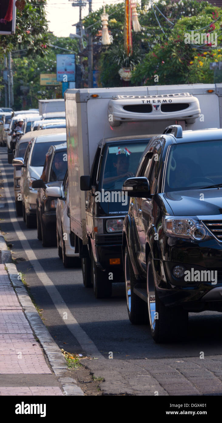 Traffic jam Ubud Indonesia Bali city main street cars congestion people ...