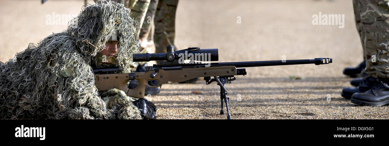 London, UK. 26th Oct, 2013. Rifleman Mitchell, a sniper from The Rifles ...