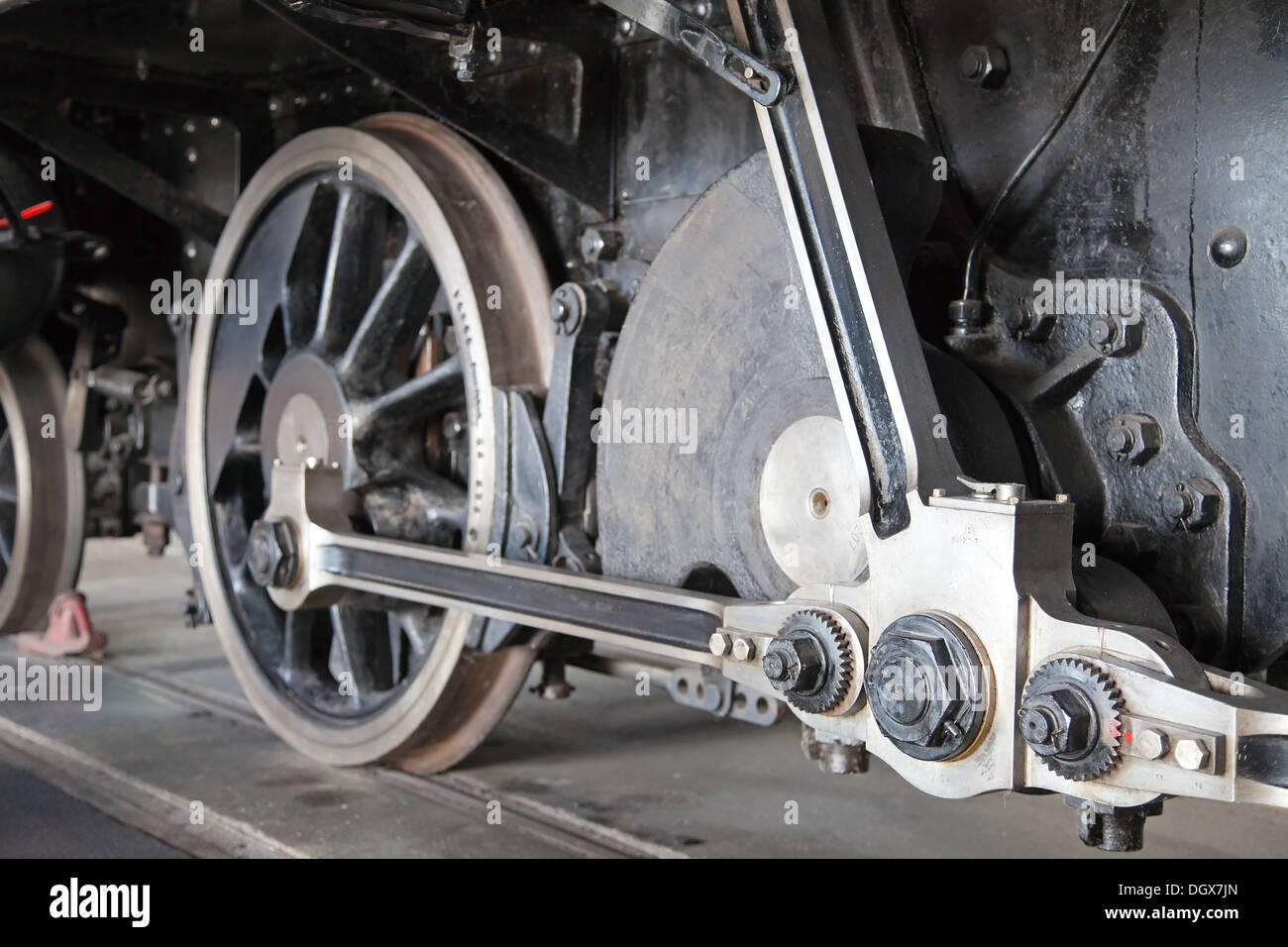 Close-up of the huge train wheels in the museum Stock Photo - Alamy
