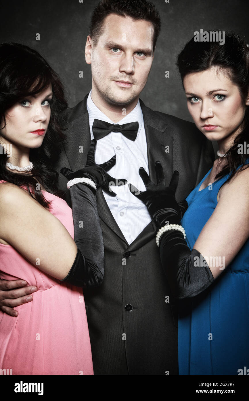 Love triangle. Two women and one man. Betrayal Stock Photo - Alamy