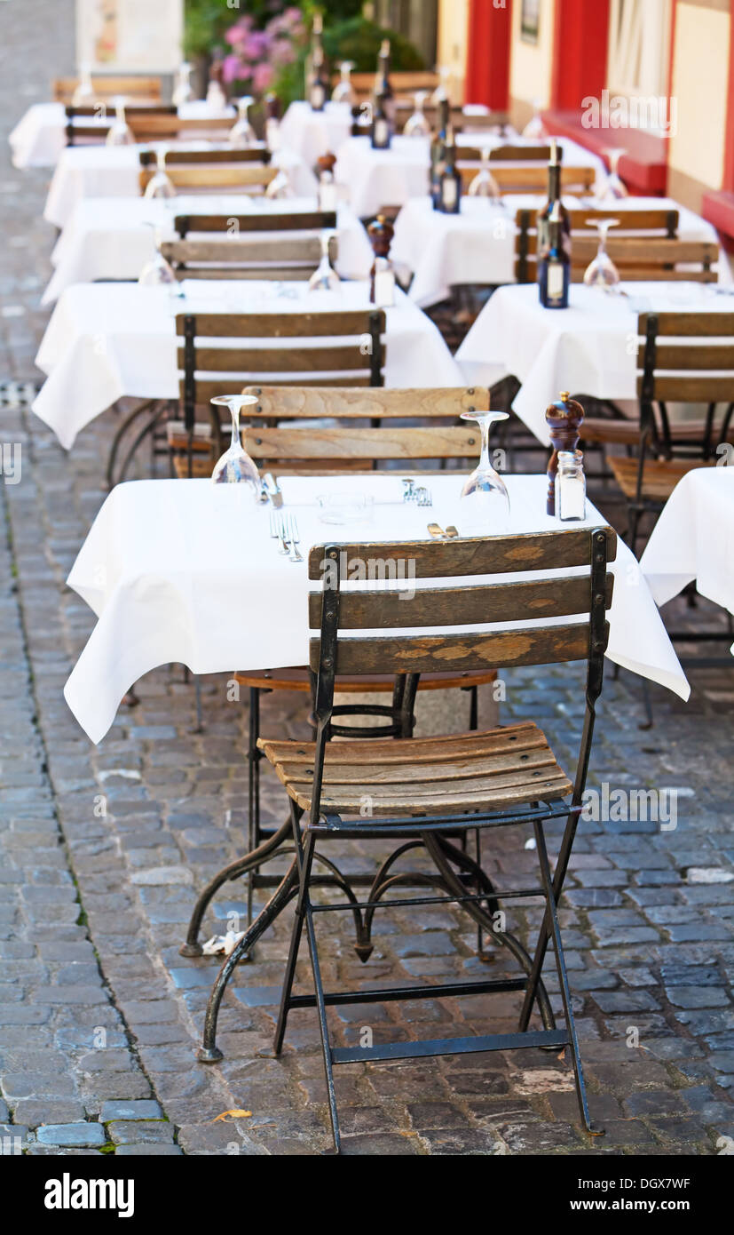 Small street cafe opened for visitors Stock Photo - Alamy