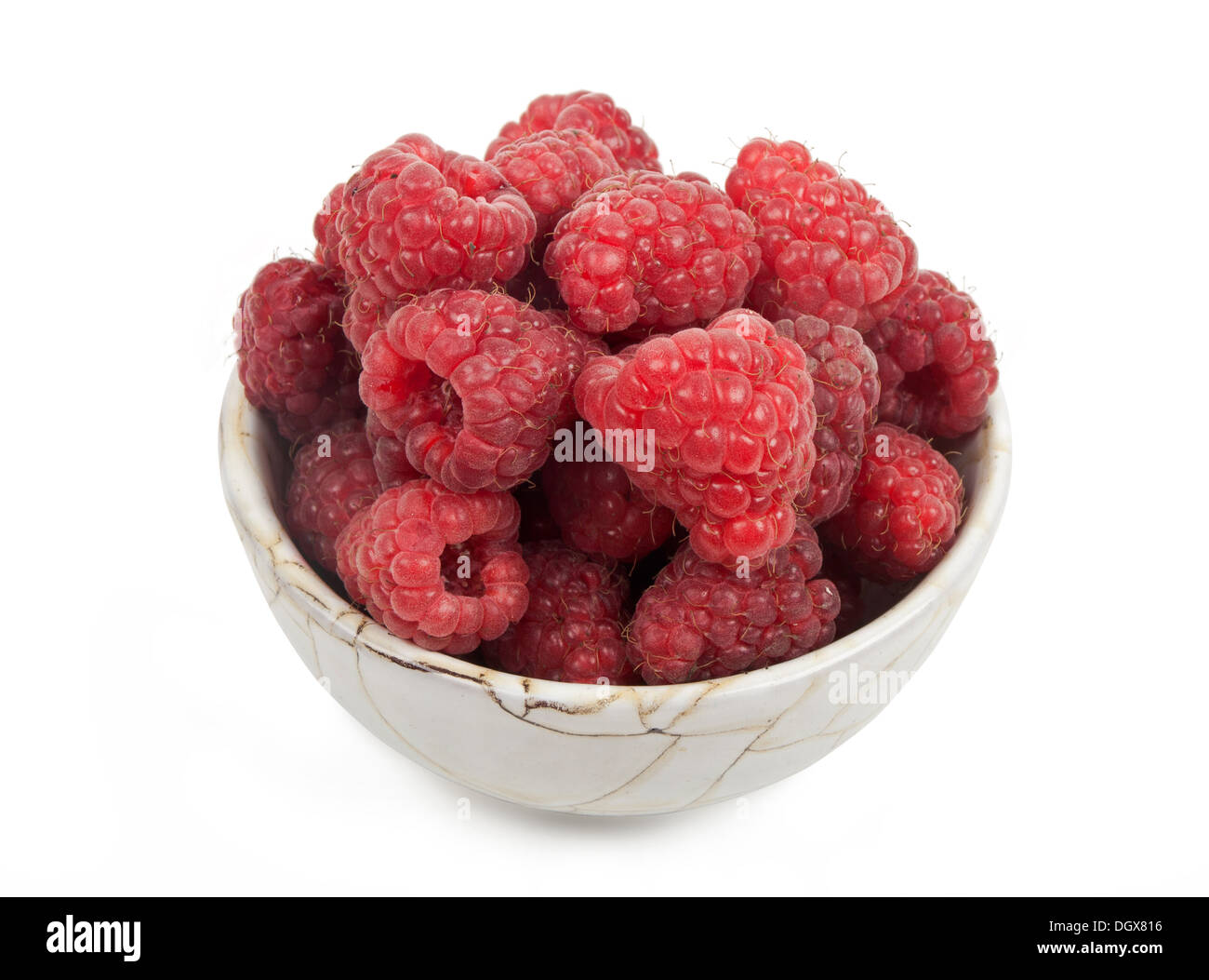 cup of raspberries over white background Stock Photo - Alamy