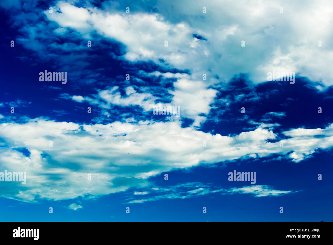 Blue sky with stratus clouds Stock Photo - Alamy