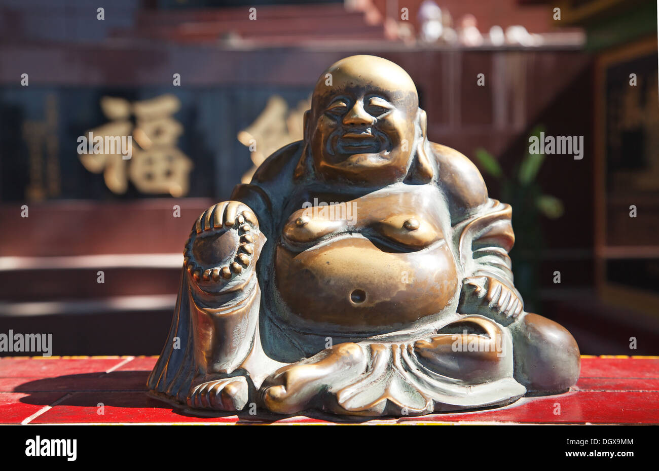"Lucky buddha" statue in chinese temple Stock Photo - Alamy